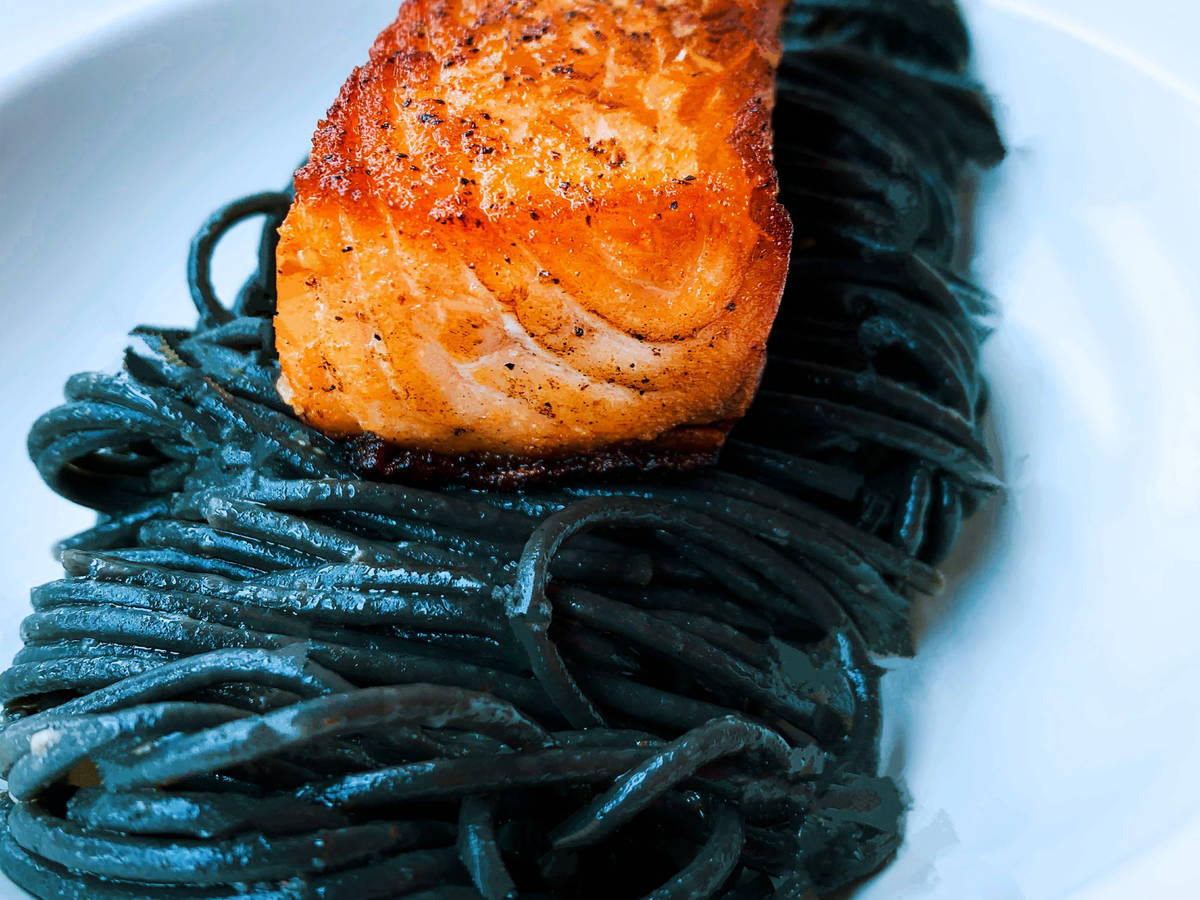 Crispy salmon and squid ink pasta | Recipe | Kitchen Stories